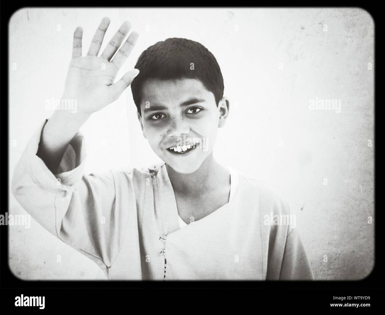 Boy waving hi-res stock photography and images - Alamy