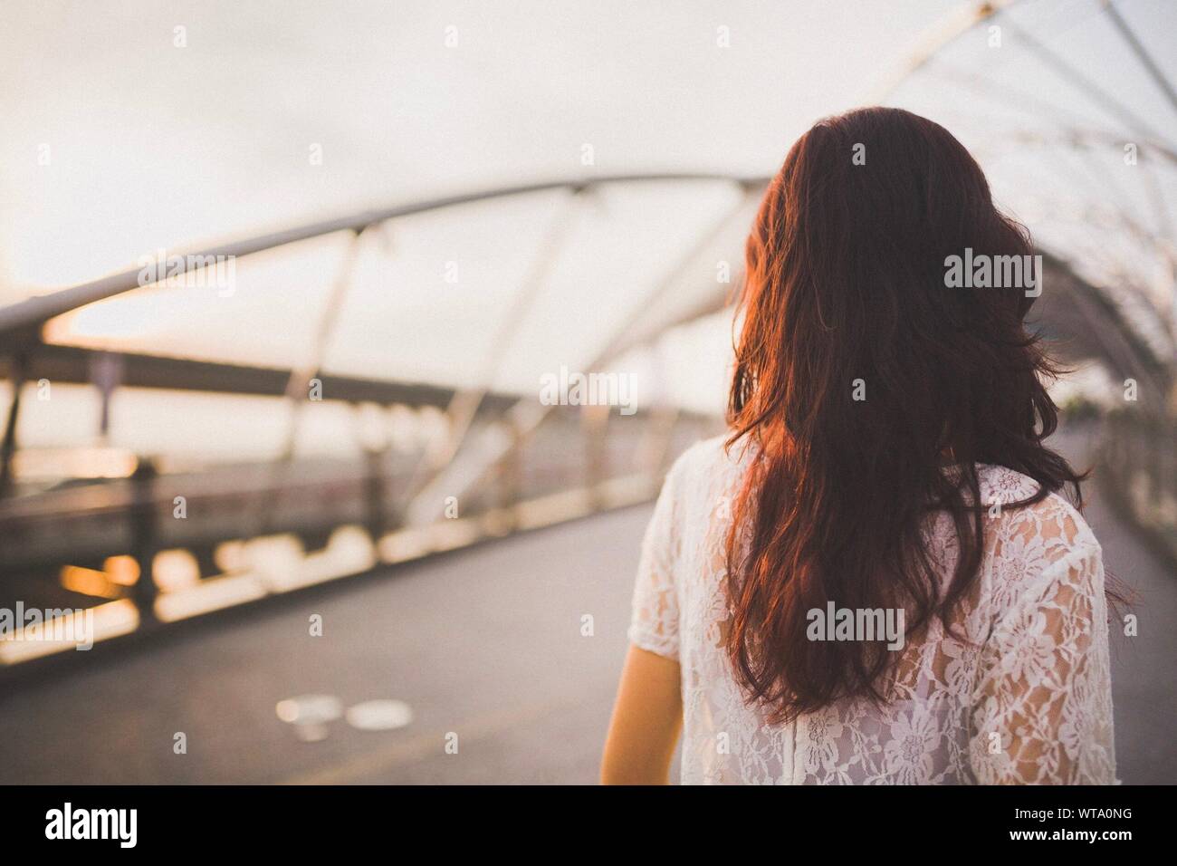 Woman on bridge hi-res stock photography and images - Alamy