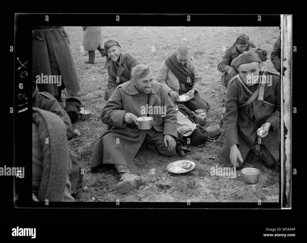 Community eating Black and White Stock Photos & Images - Alamy