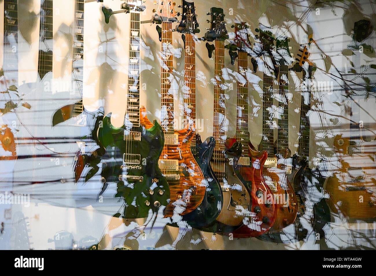 Guitar display in store hi-res stock photography and images - Alamy