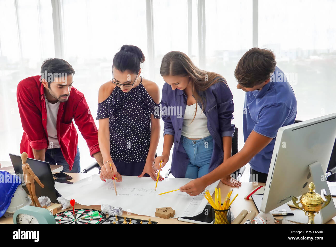 Creative business people working in start up office Group Of Asian and ...