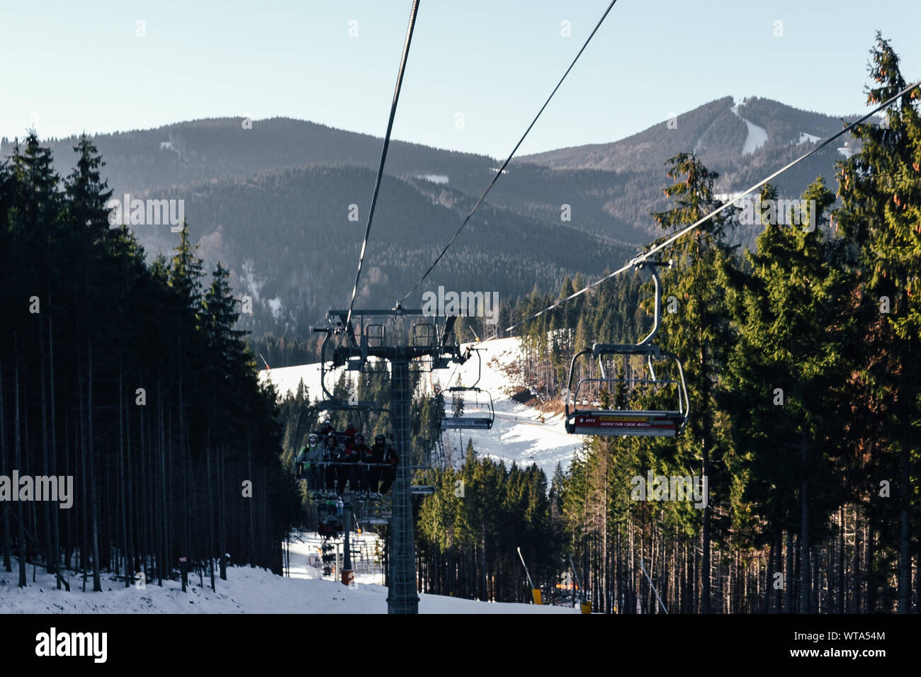 Bukovel, Ukraine. 2, 2017 A lift for skiers and snowboarders rises to ...