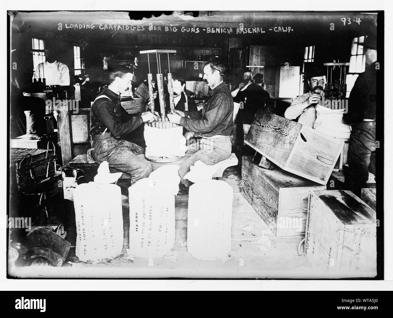 Men loading cartridges for big guns, Benicia Arsenal, Calif Stock Photo ...
