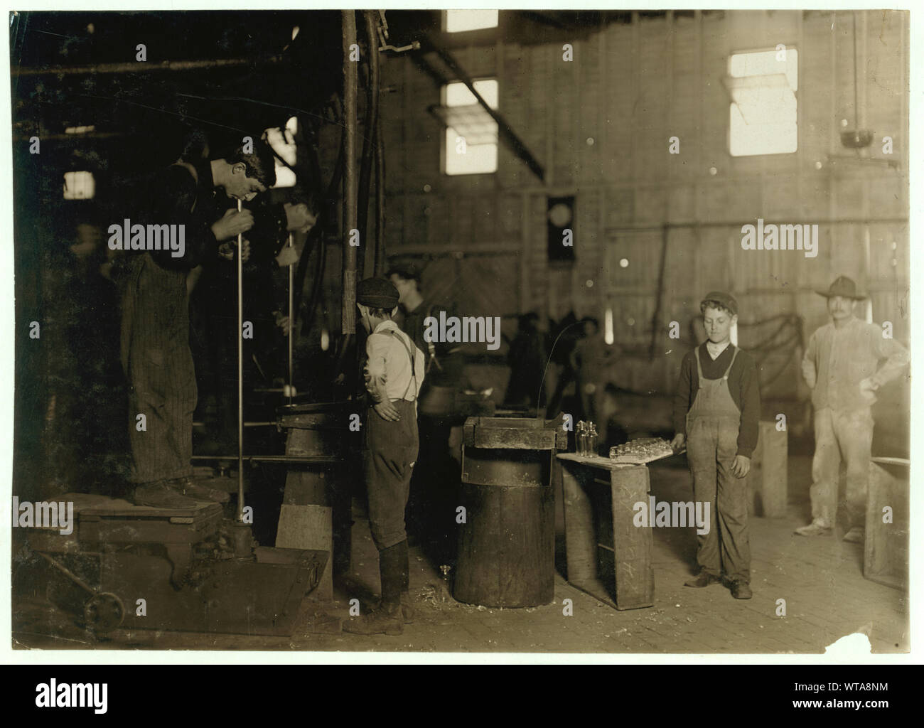 Men with Foot Mold and Boys. A West Virginia Glass Works. Photographs ...