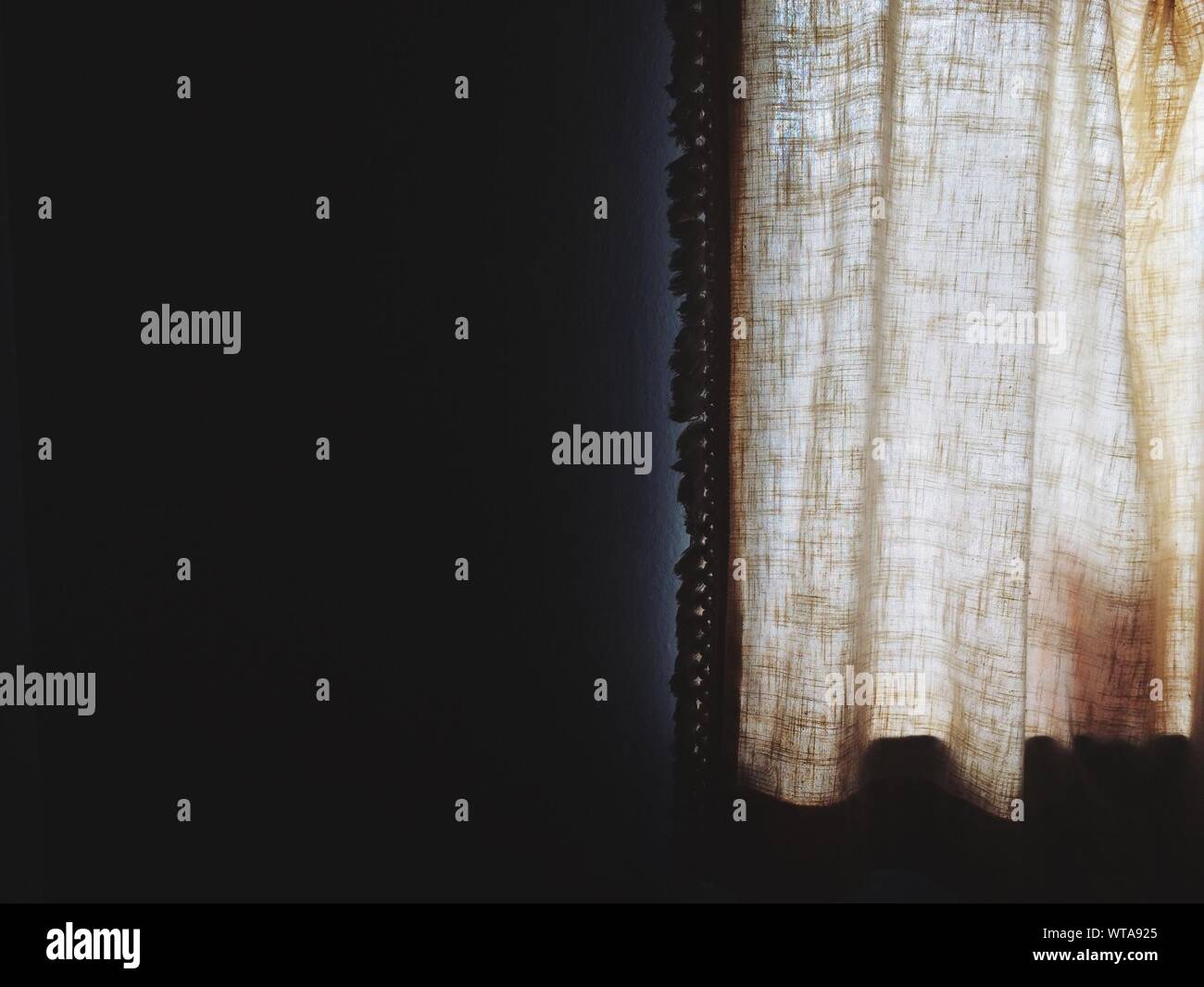 Sun rays through window curtain hi-res stock photography and images - Alamy