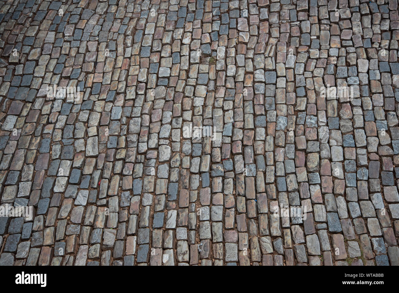 Cobblestone pavement in historical city of Brazil Stock Photo - Alamy