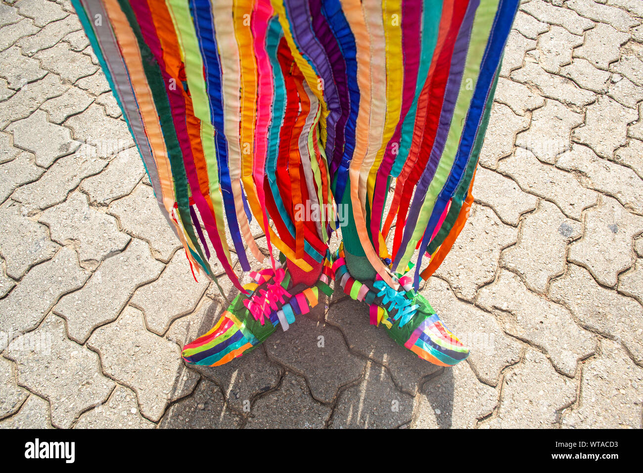 Colorful trousers with ribbons and clown shoes Stock Photo - Alamy