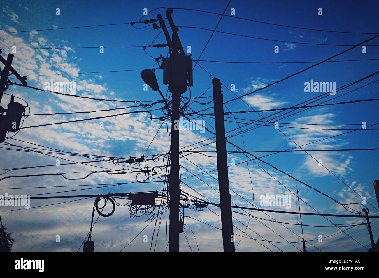 Sky and utility poles hi-res stock photography and images - Alamy
