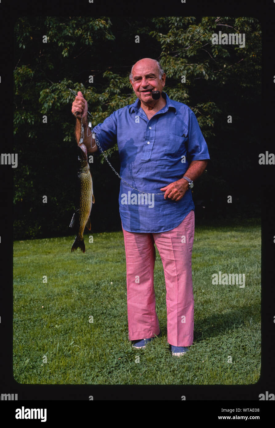 Menges, man with fish, Livingston Manor, New York Stock Photo - Alamy