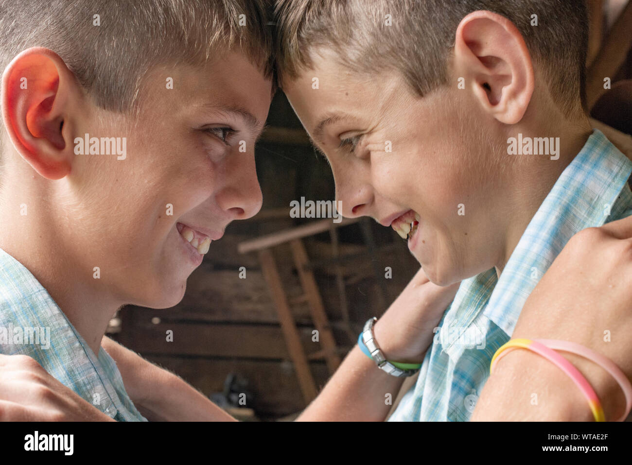 Smiling twin brothers in hi-res stock photography and images - Alamy