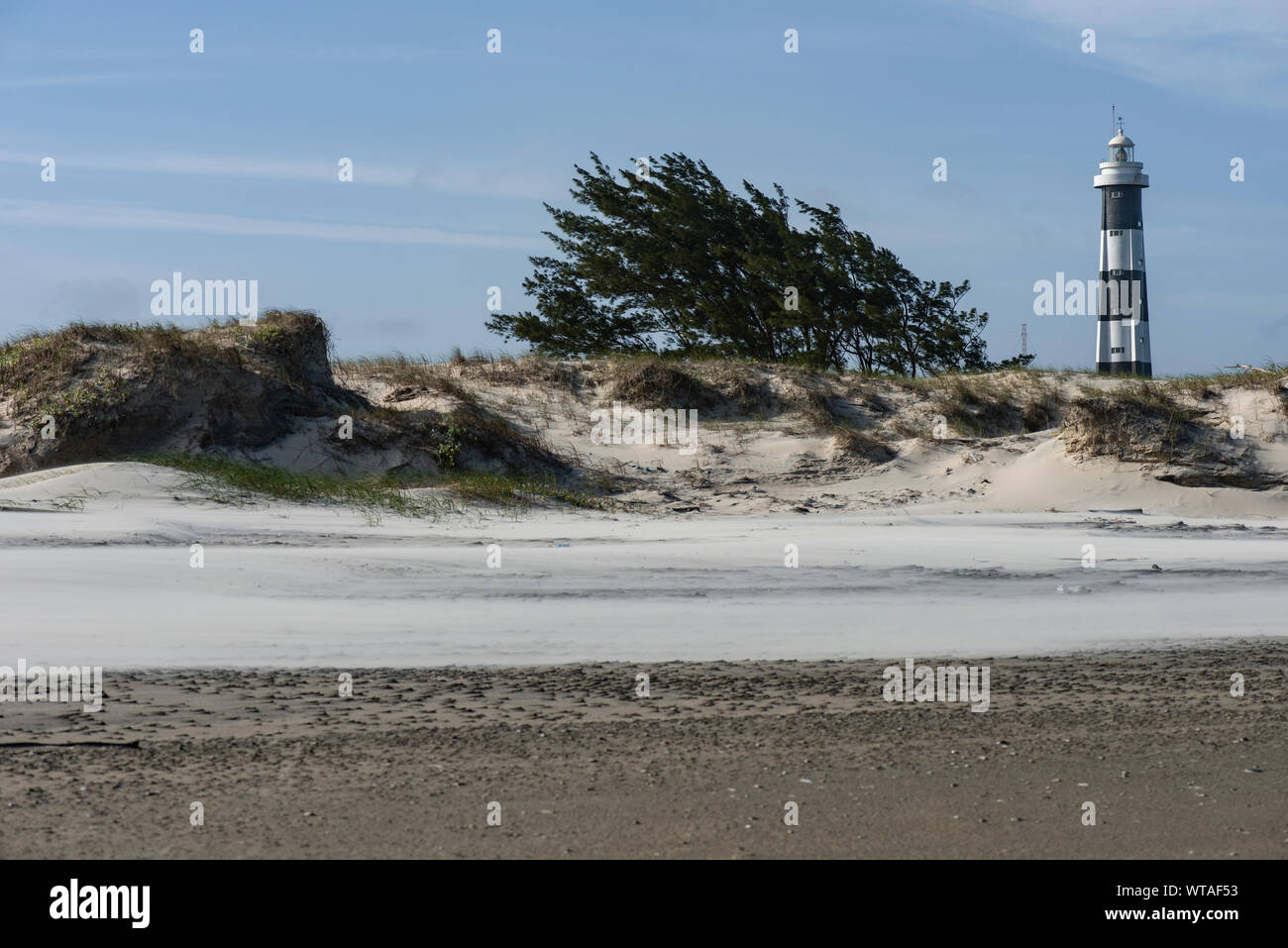 Lighthouse in southern Brazilian beach Stock Photo - Alamy