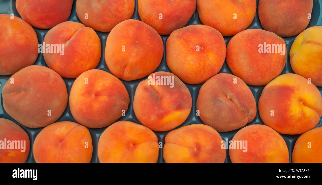 Ripe peach row hi-res stock photography and images - Alamy