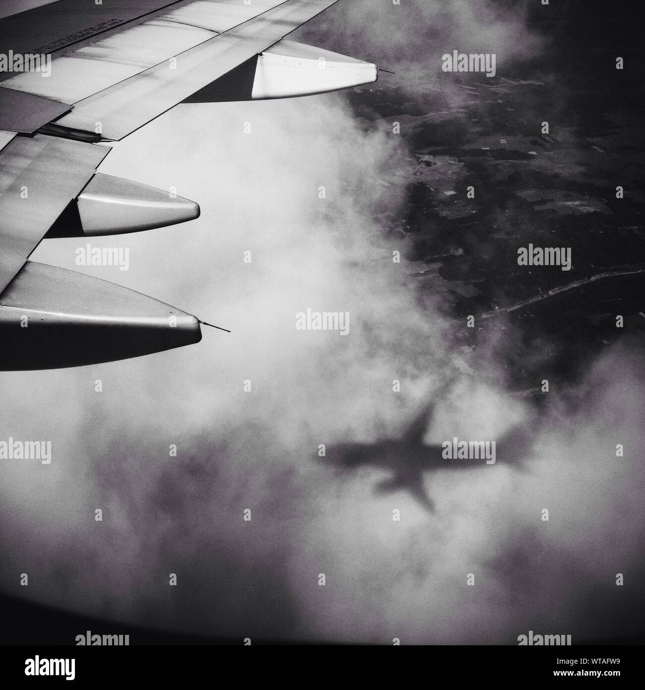 Airplane wing shadow hi-res stock photography and images - Alamy