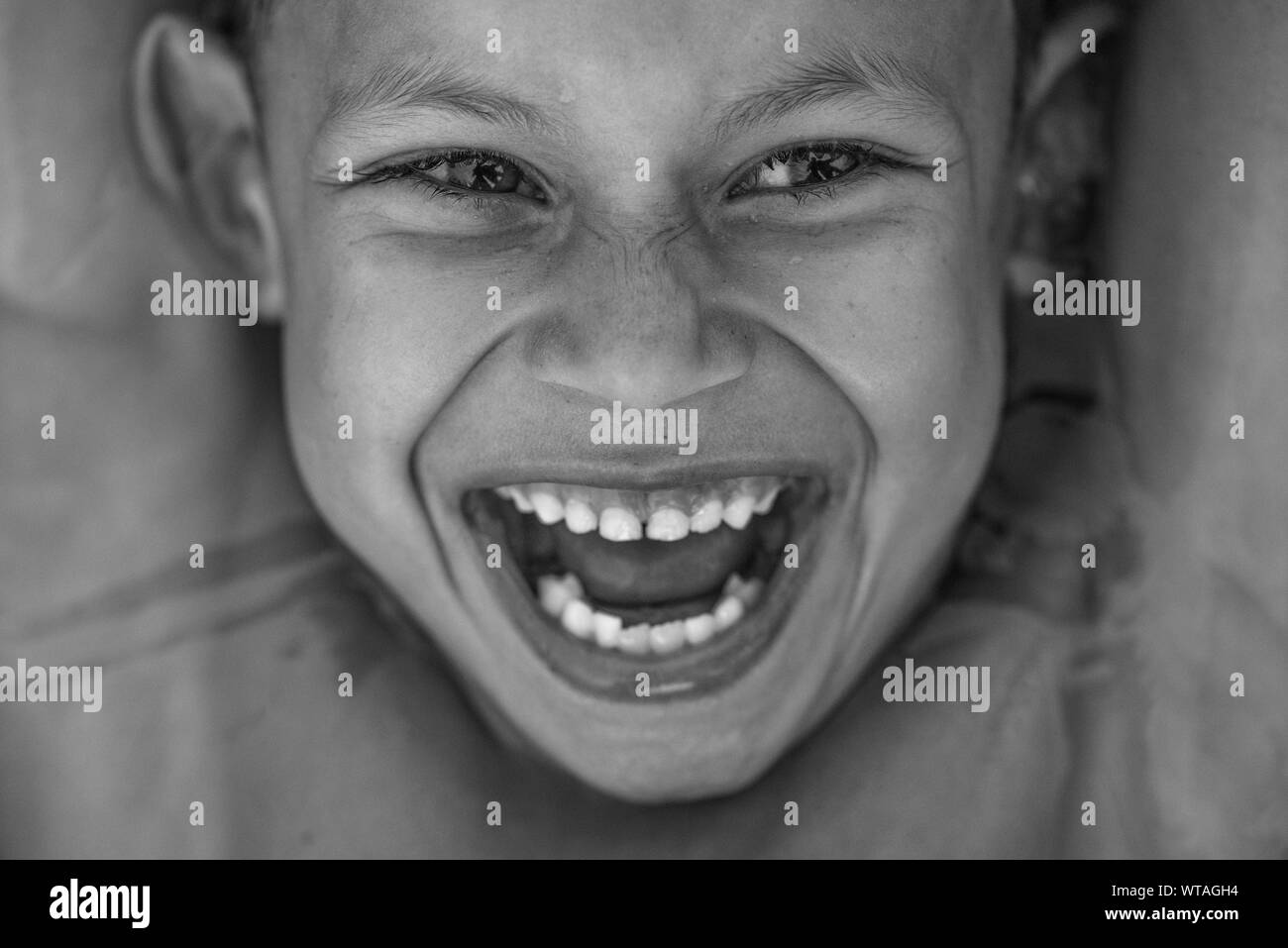 Laughing boy south america Black and White Stock Photos & Images - Alamy