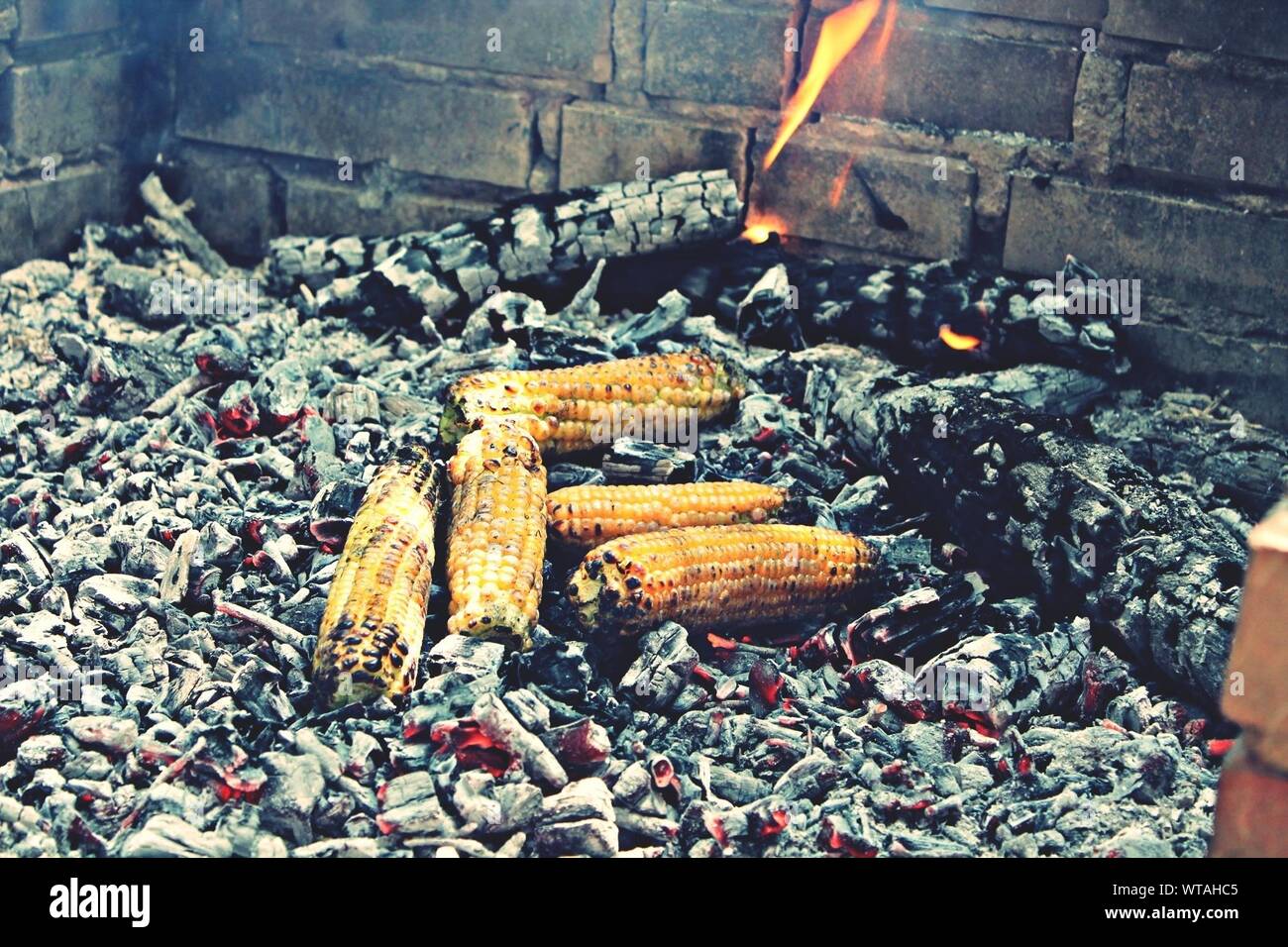 Burning corn hi-res stock photography and images - Alamy