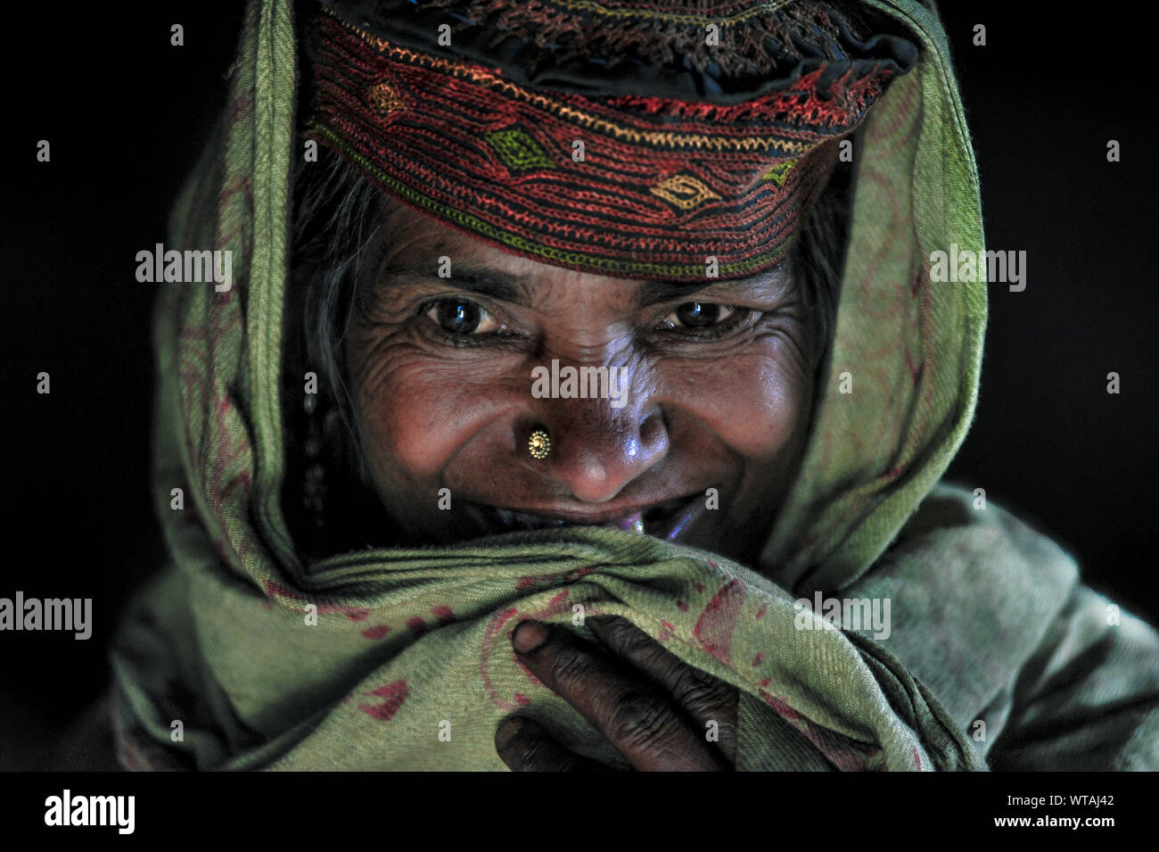 Old Gujjar woman smiling Stock Photo - Alamy