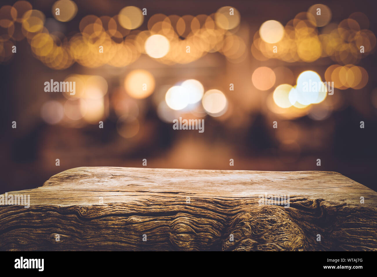 Wood texture table top (counter bar) with blur light gold bokeh in cafe ...