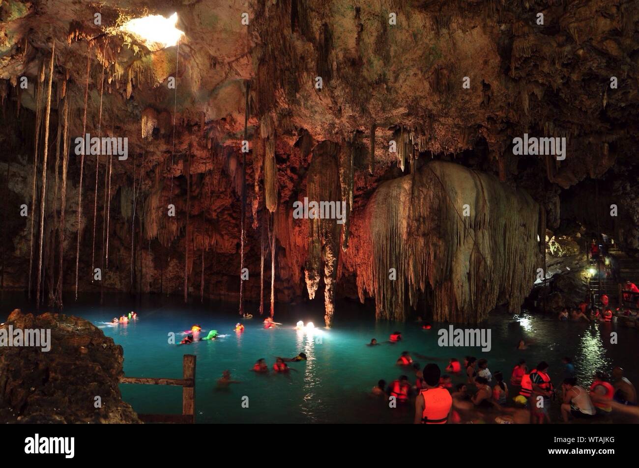 People swimming in cenote hi-res stock photography and images - Alamy