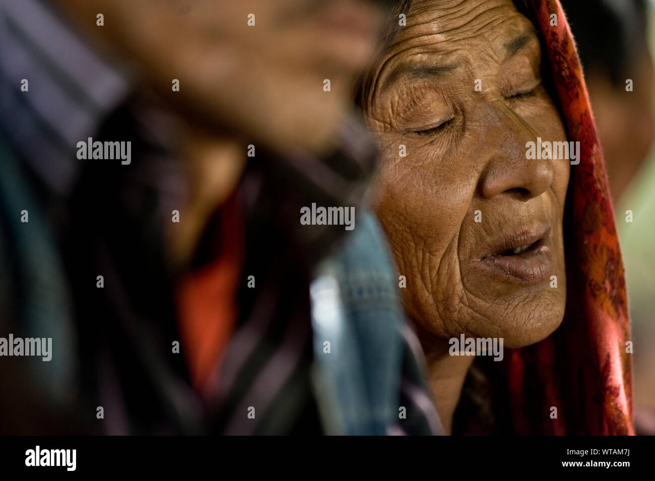 Indian woman praying hi-res stock photography and images - Alamy
