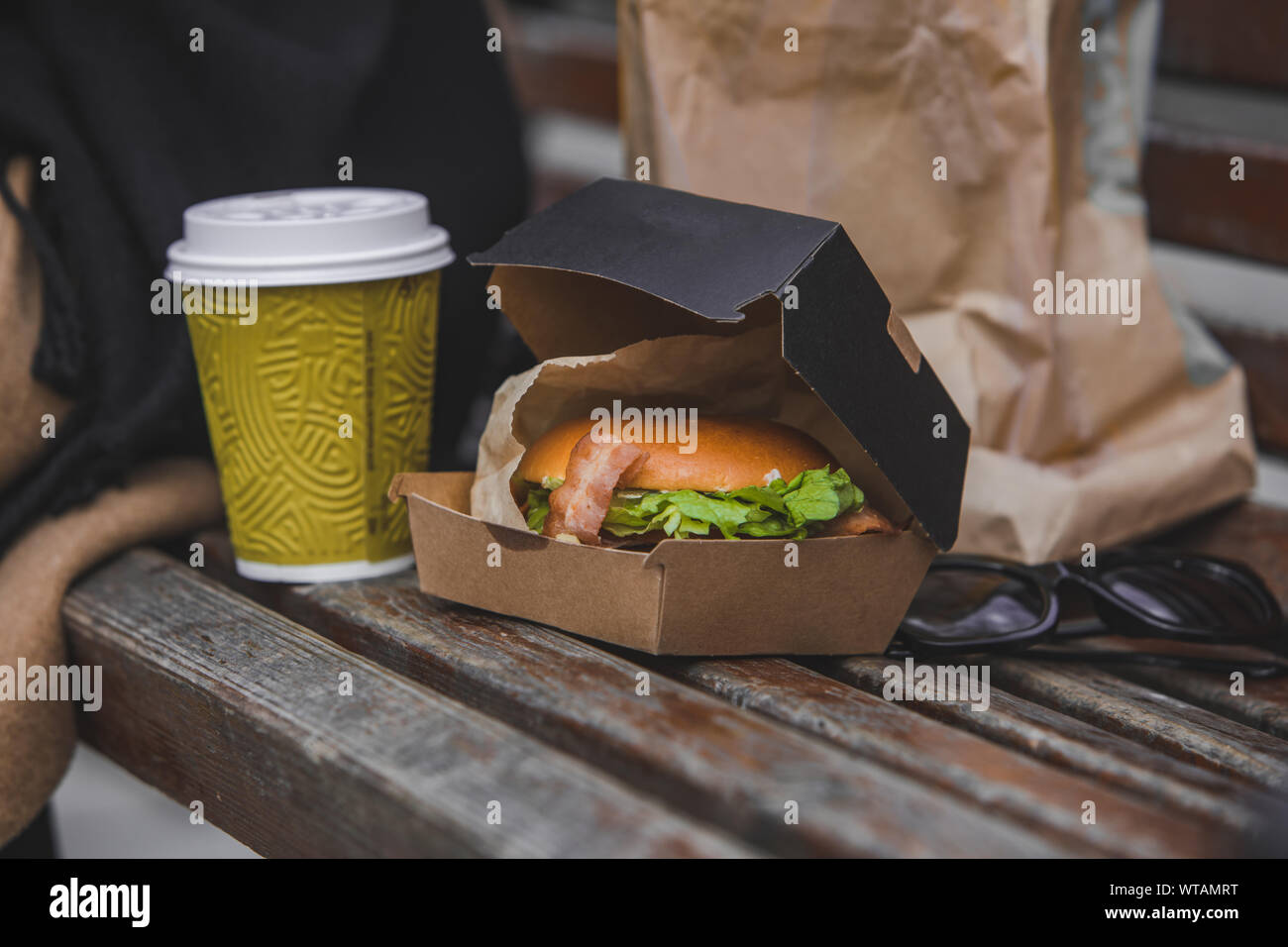 Man eating sandwich bench hi-res stock photography and images - Alamy