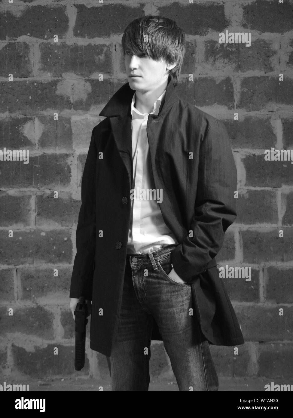 Man gun coat hi-res stock photography and images - Alamy