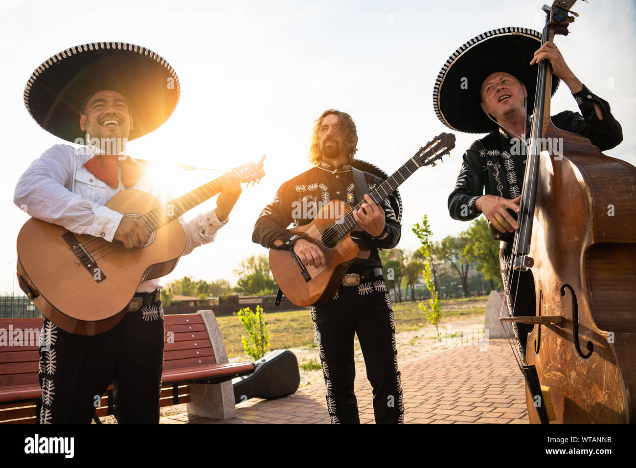 Mexican musicians mariachi band give street concert Stock Photo - Alamy