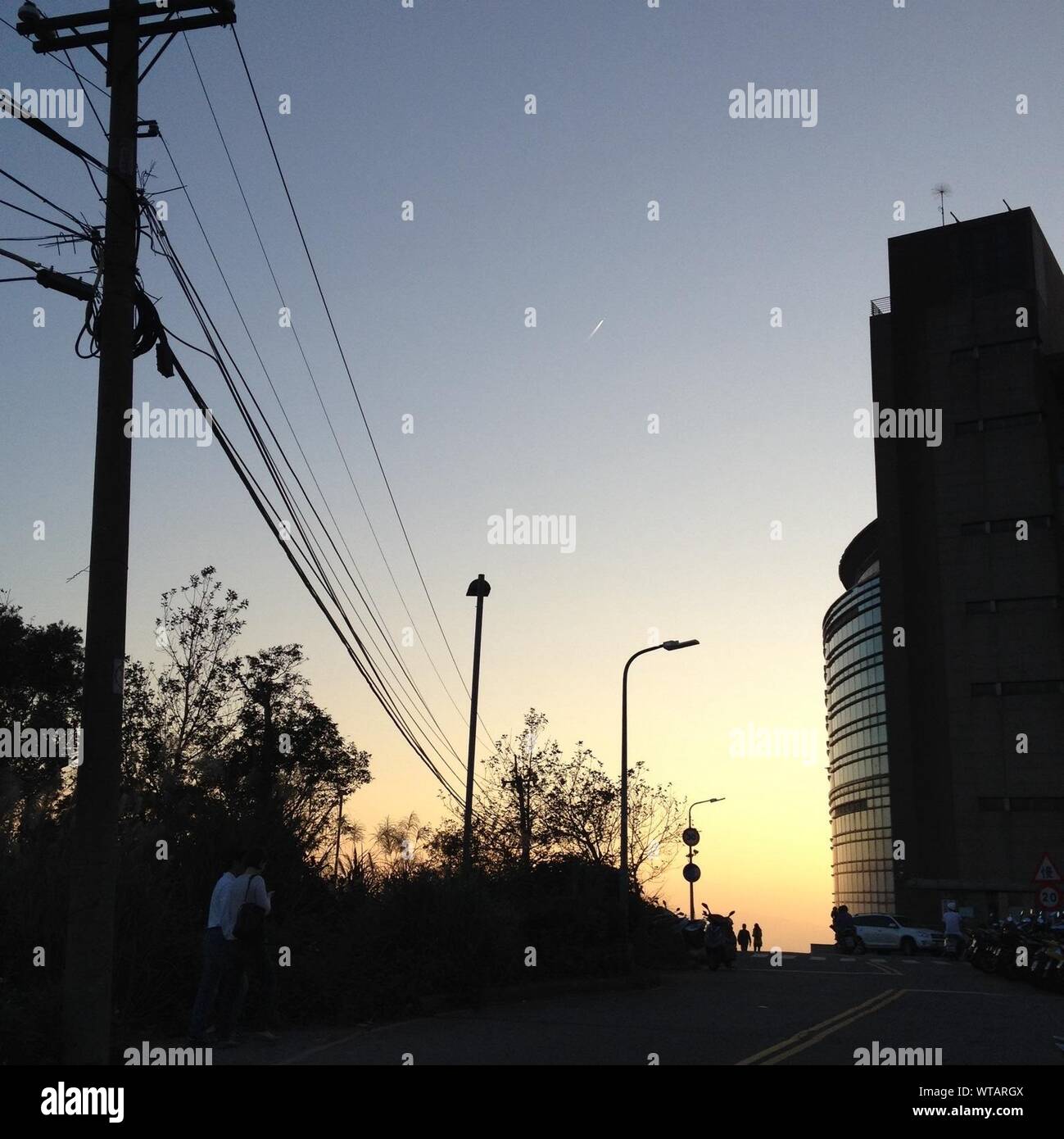 Dusk city street building hi-res stock photography and images - Alamy