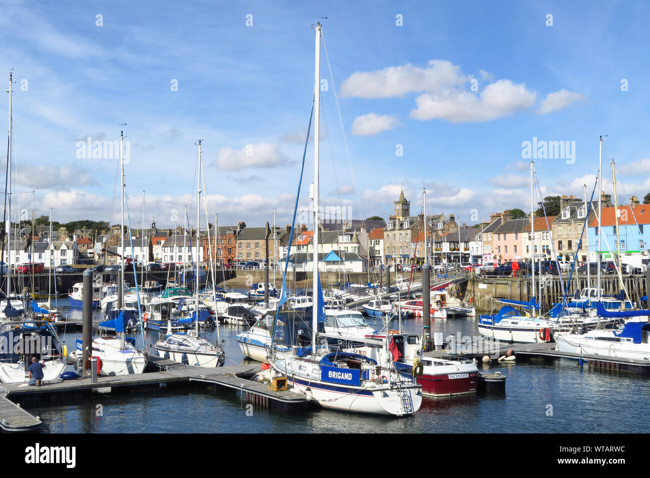 Boats in the harbour of the Fife fishing village of Anstruther Stock ...