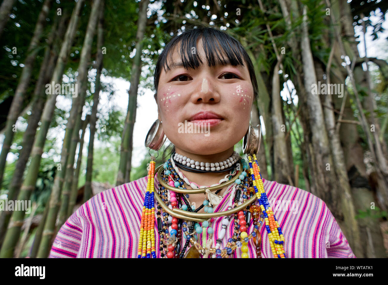 Beautiful Akha woman in the forest Stock Photo - Alamy
