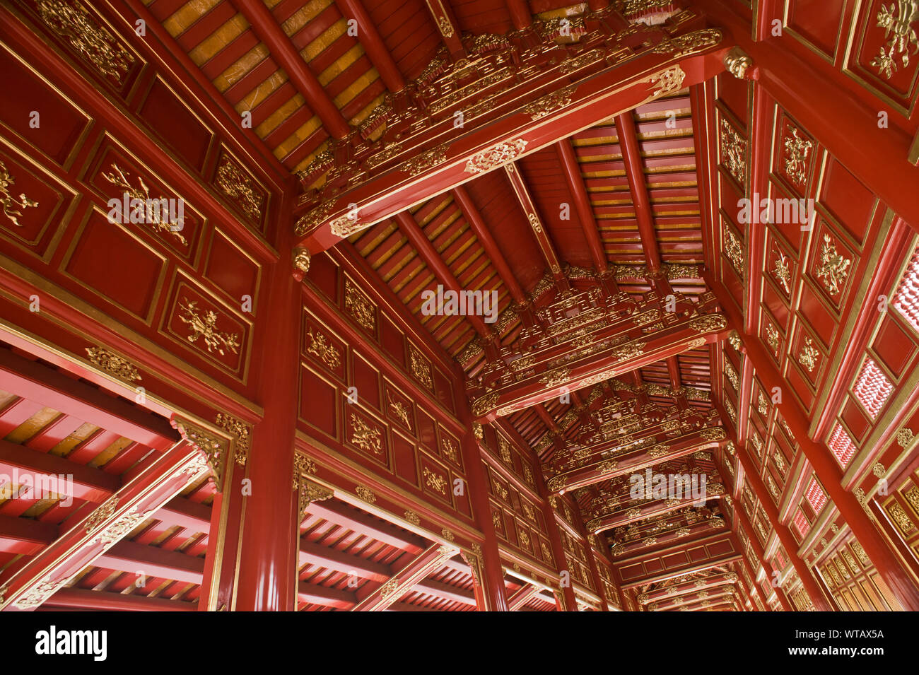 Reddish ceiling of wooden royal corridor at Imperial City of Hue Stock ...
