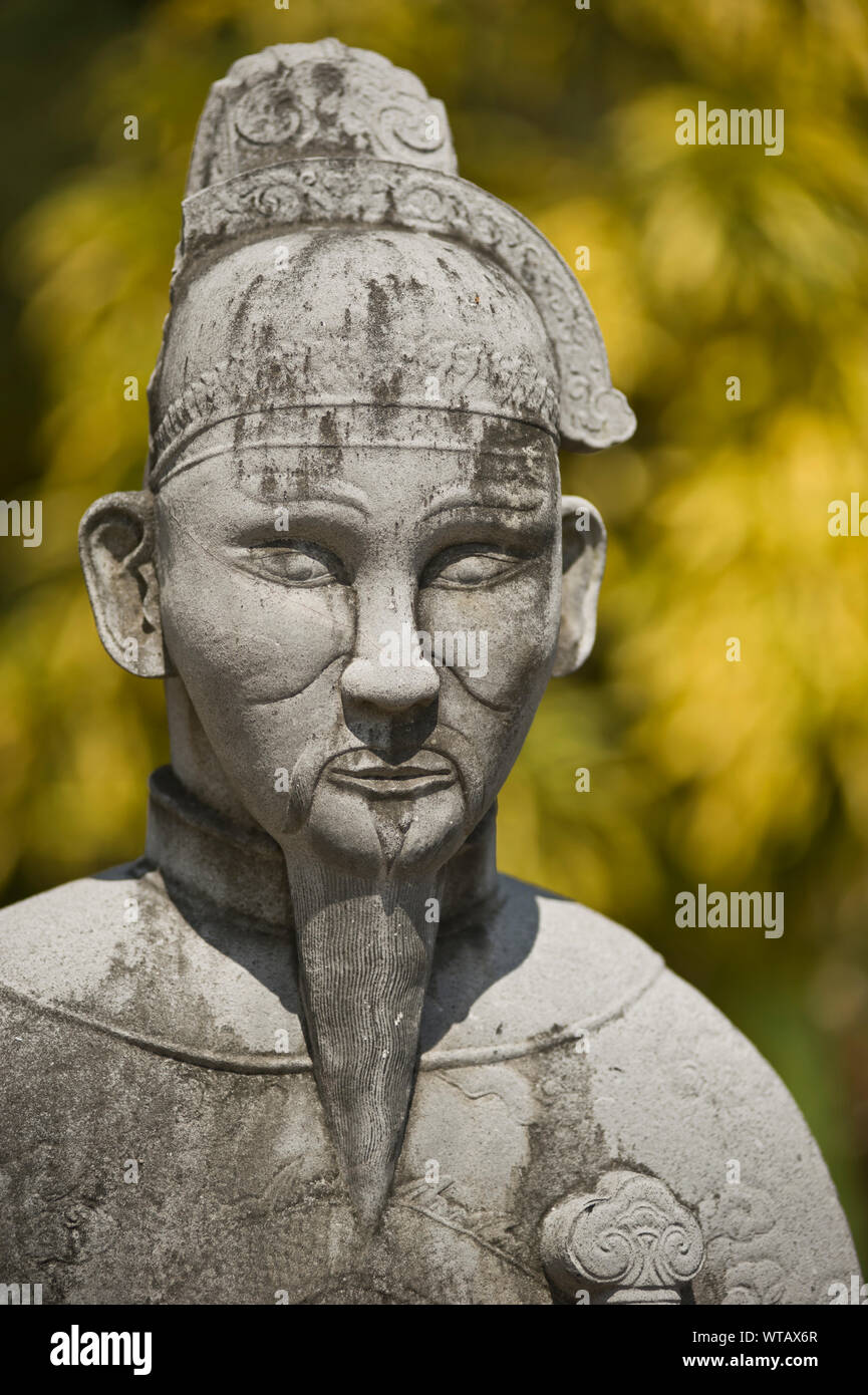 Stone guard statue in the entrance of The Tomb of Khai Stock Photo - Alamy