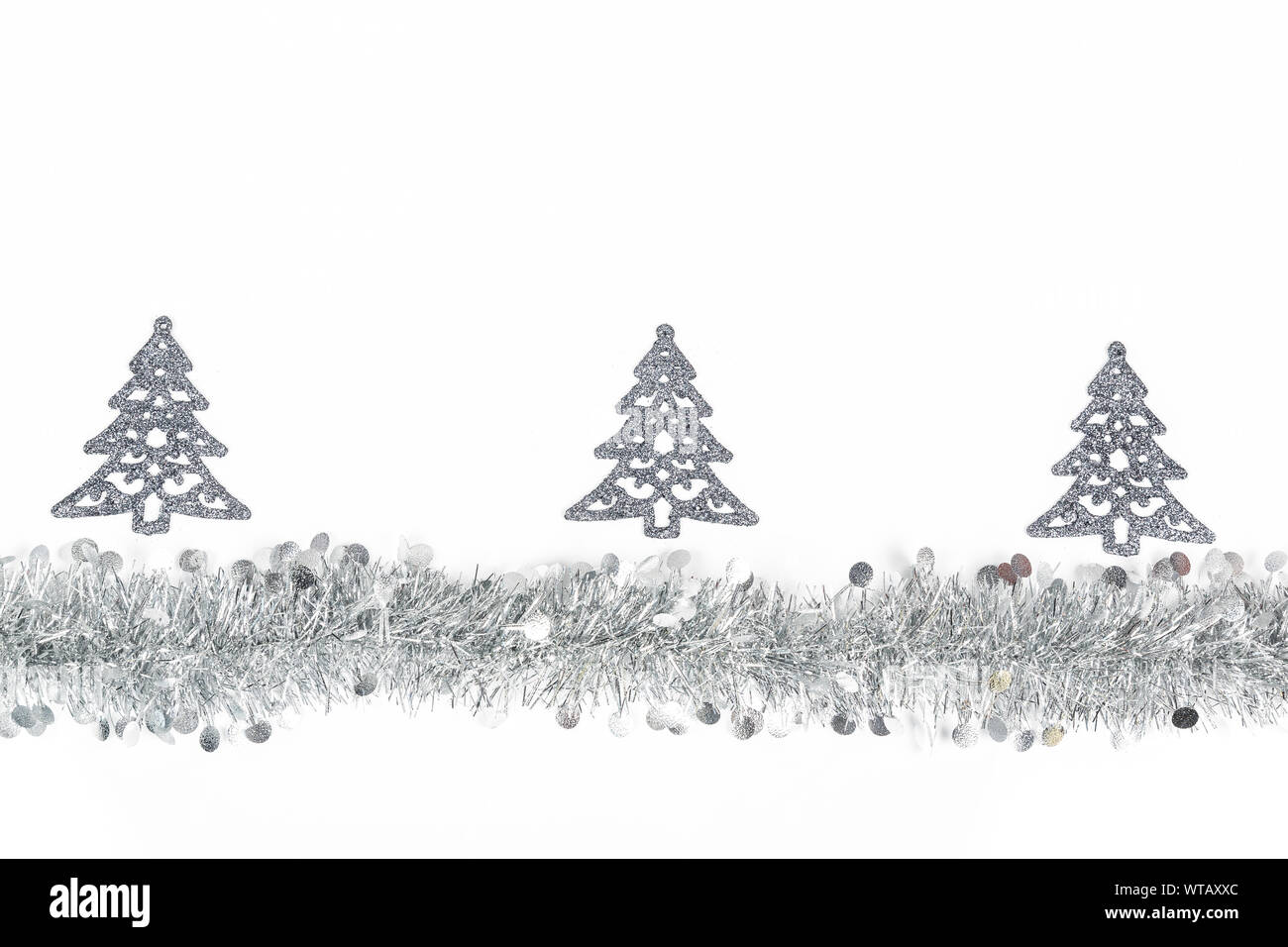 Christmas silver grey garland and silver trees decoration photo on ...