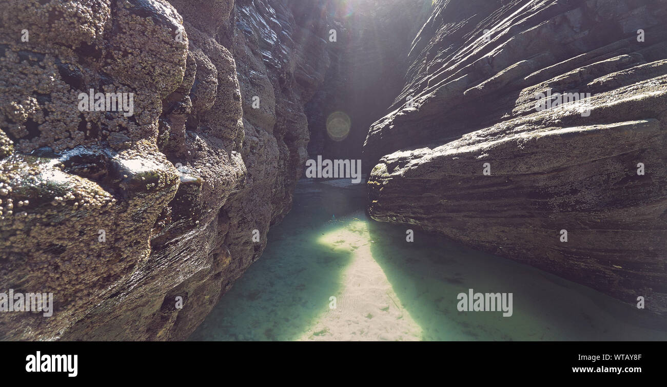 Landscape of a beach with rocky cliffs in Galicia Stock Photo - Alamy