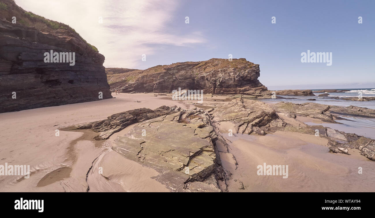 Landscape of a beach with rocky cliffs in Galicia Stock Photo - Alamy