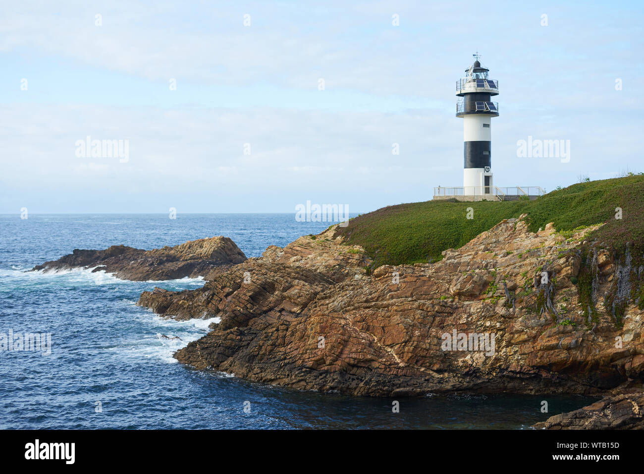 Illa Pancha lighthouse in Ribadeo, Galicia, Spain Stock Photo - Alamy
