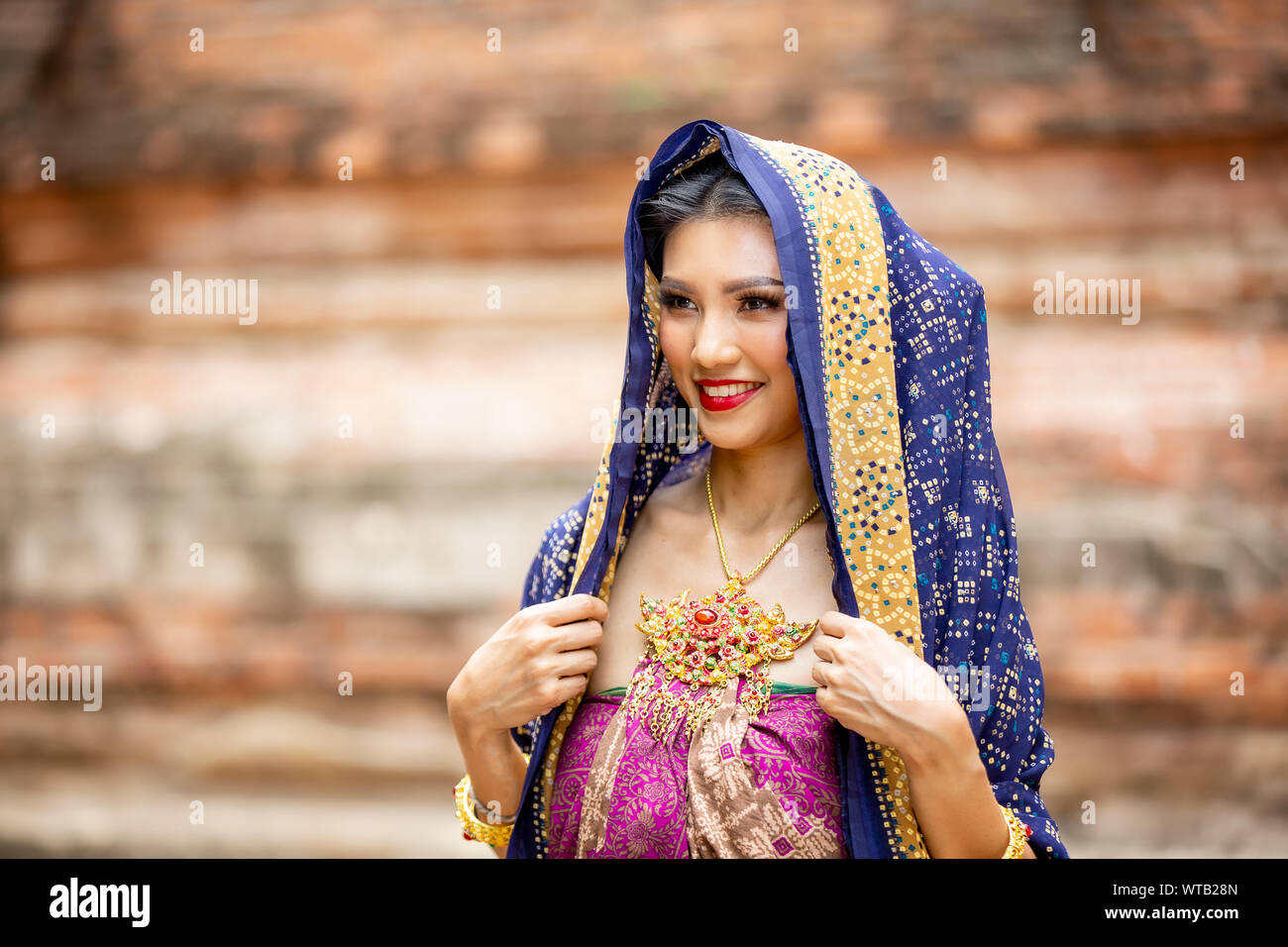 Woman In Traditional Clothing Standing Outdoors Stock Photo - Alamy