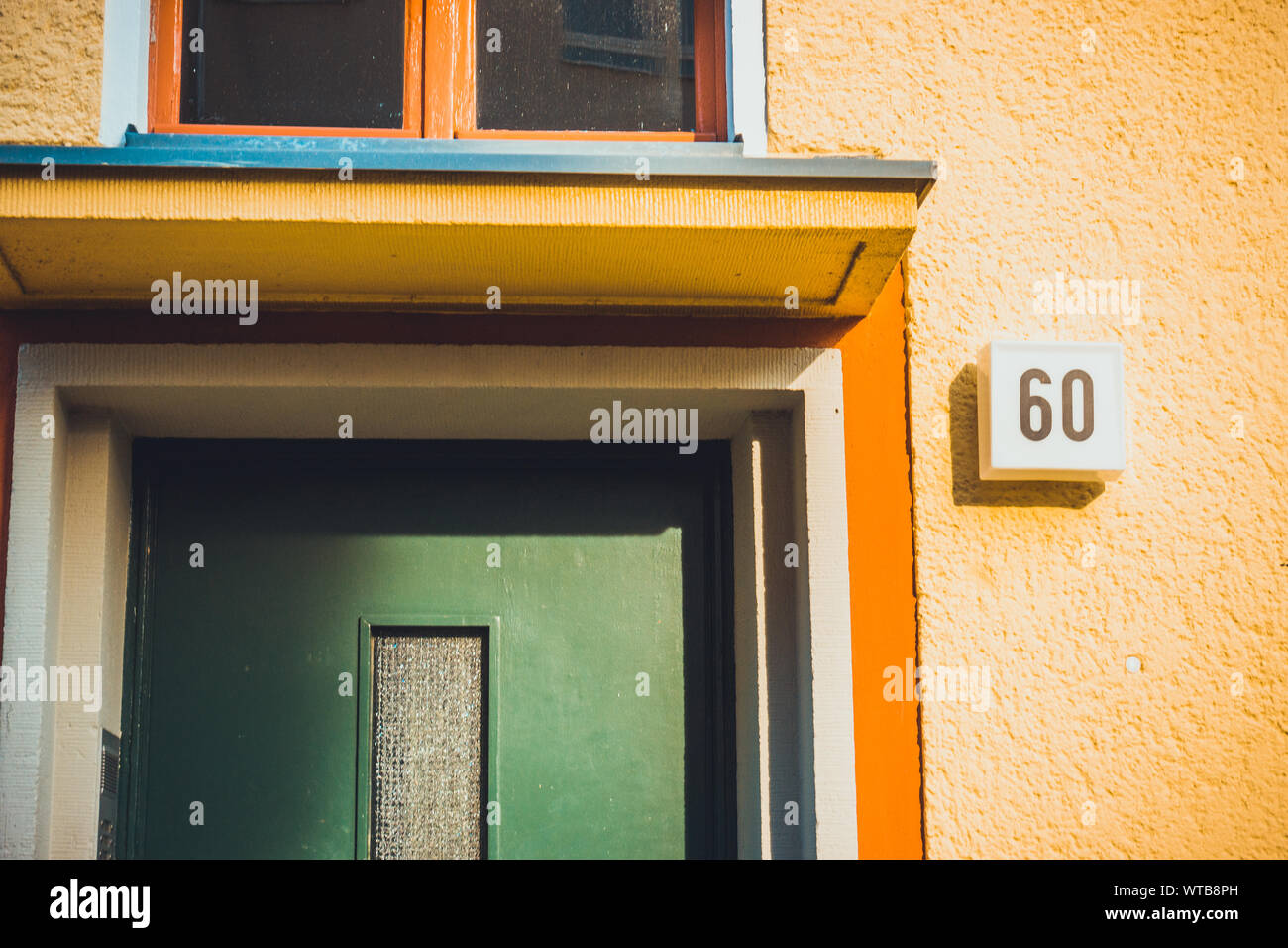 entrance door with number 60 sign Stock Photo - Alamy