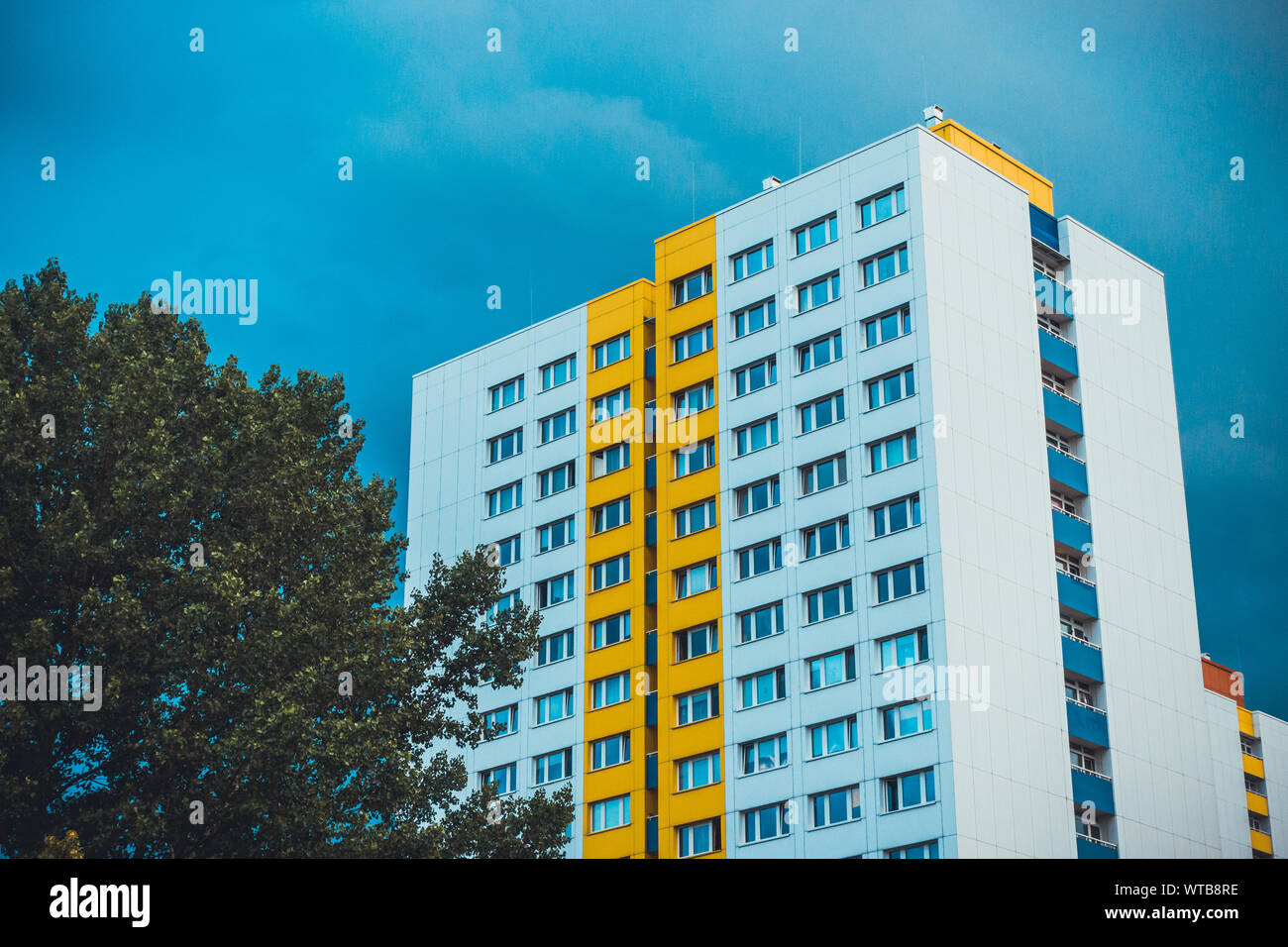 Town berlin wall facade yellow blue hi-res stock photography and images ...