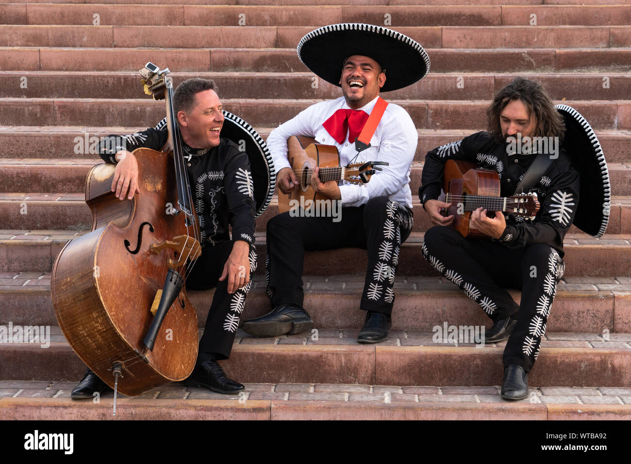 Mexican musicians mariachi band give street concert Stock Photo - Alamy
