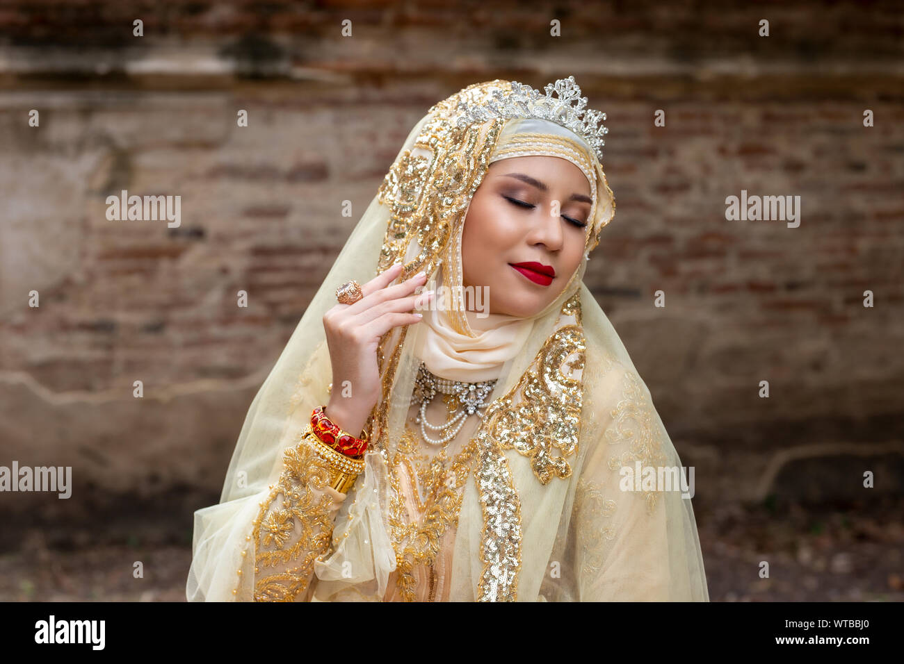 Portrait Of Woman In Traditional Clothing Standing Against Wall Stock ...