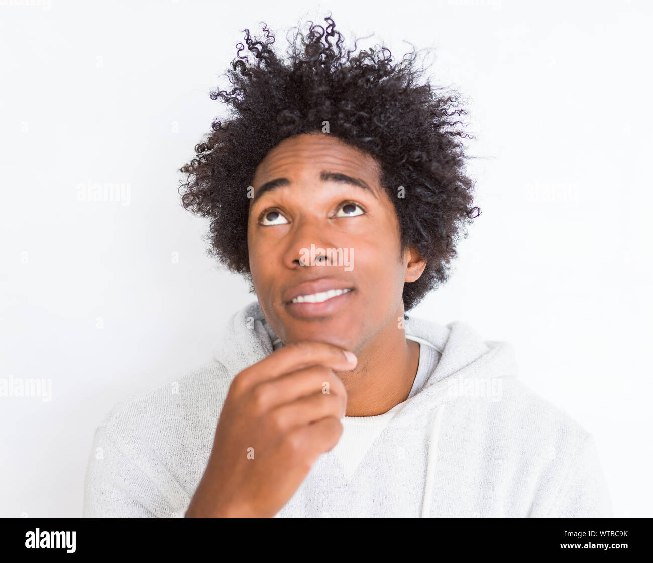 African American man over white isolated background serious face ...
