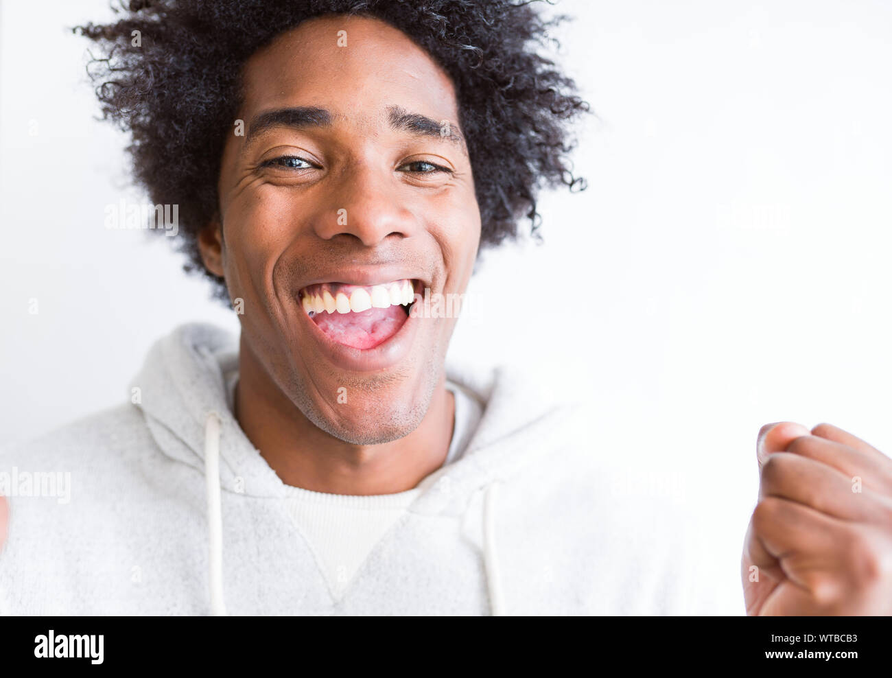 African American man over white isolated background excited for success ...