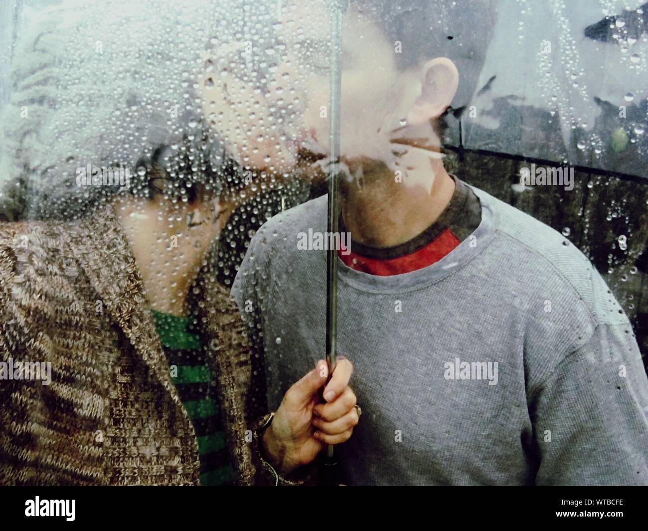 Couple Kissing Wet High Resolution Stock Photography and Images - Alamy