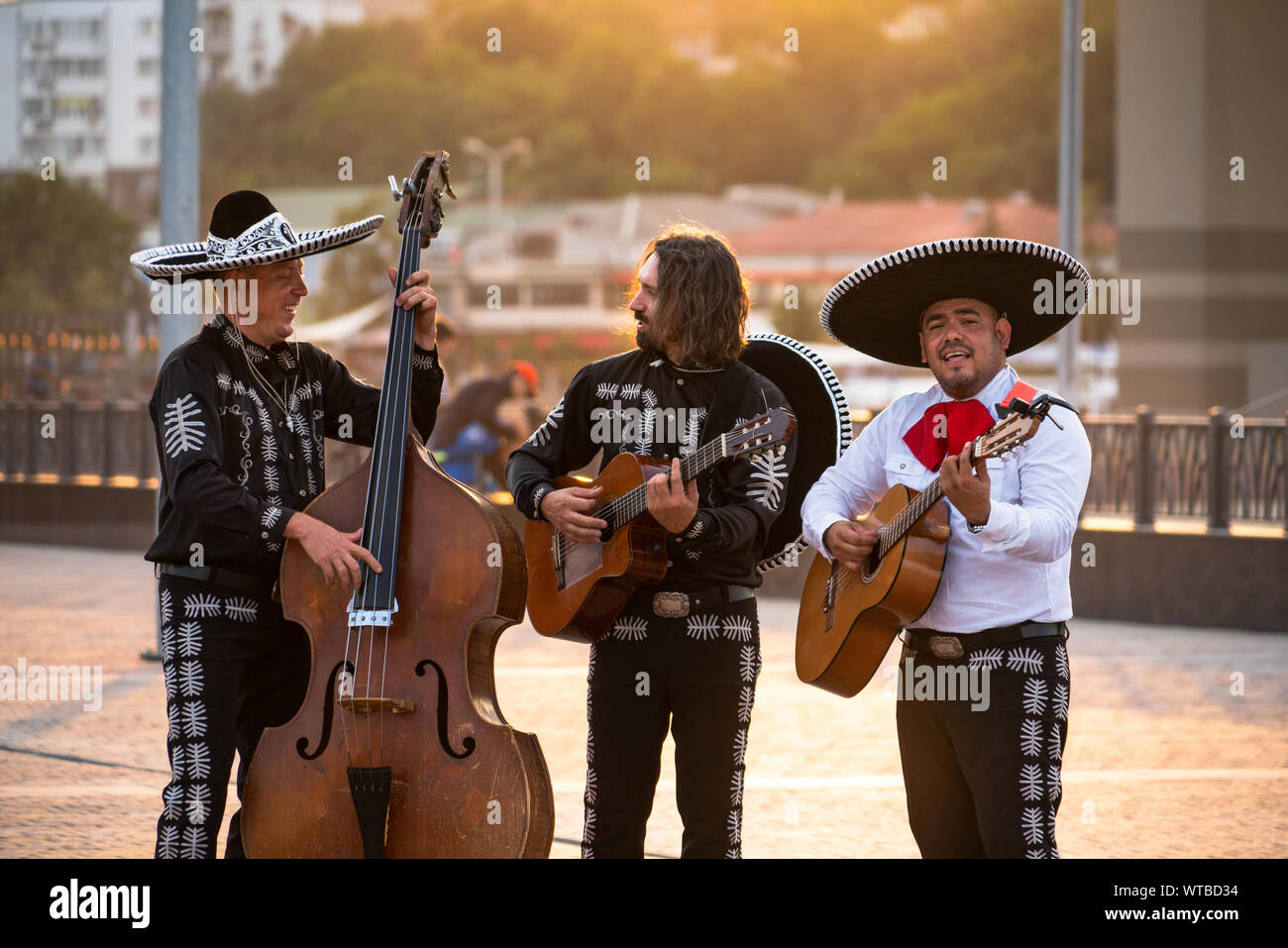 Mexican musicians mariachi band give street concert Stock Photo - Alamy