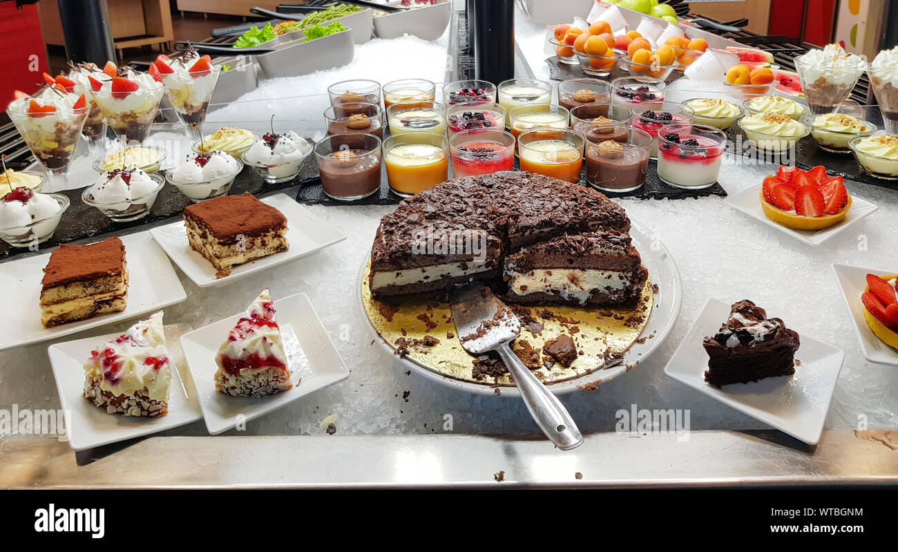 Buffet many cake, sweet on the food line, Different dessert cakes for ...