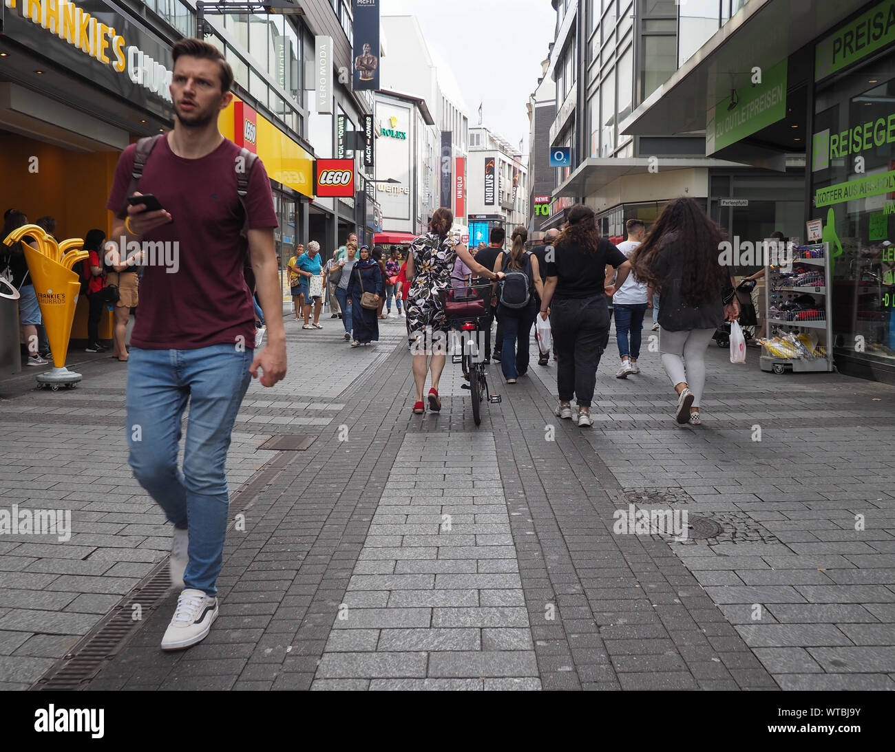 KOELN, GERMANY - CIRCA AUGUST 2019: People in Hohe Strasse (meaning ...