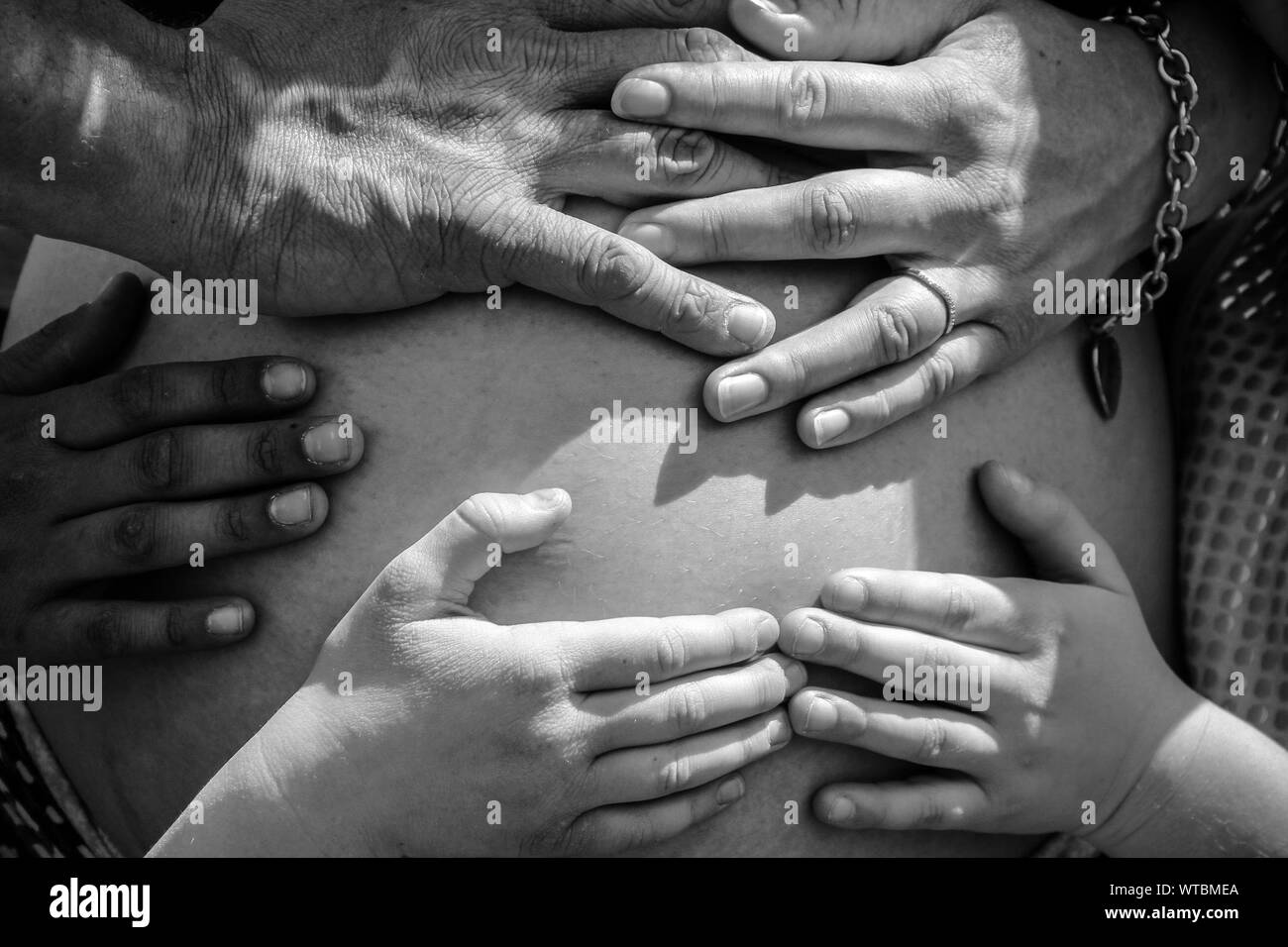 Pregnant belly hands hi-res stock photography and images - Alamy