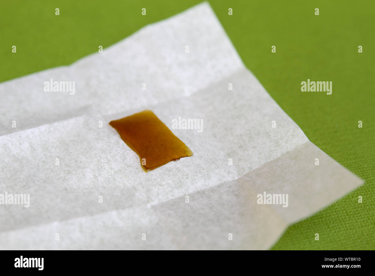 Cannabis Concentrate (Shatter) on Paper Stock Photo - Alamy