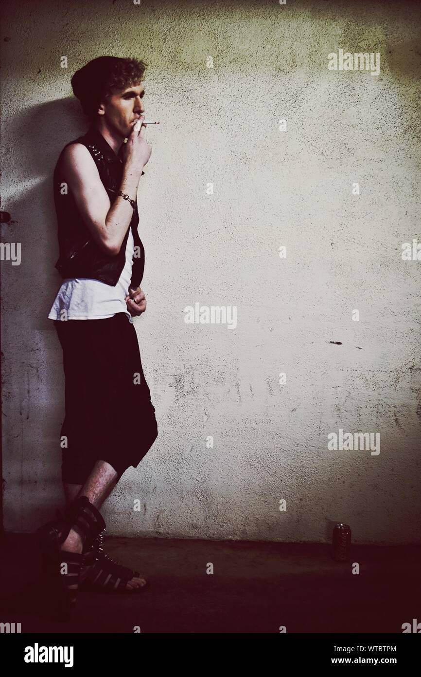 Full length smoking hi-res stock photography and images - Alamy