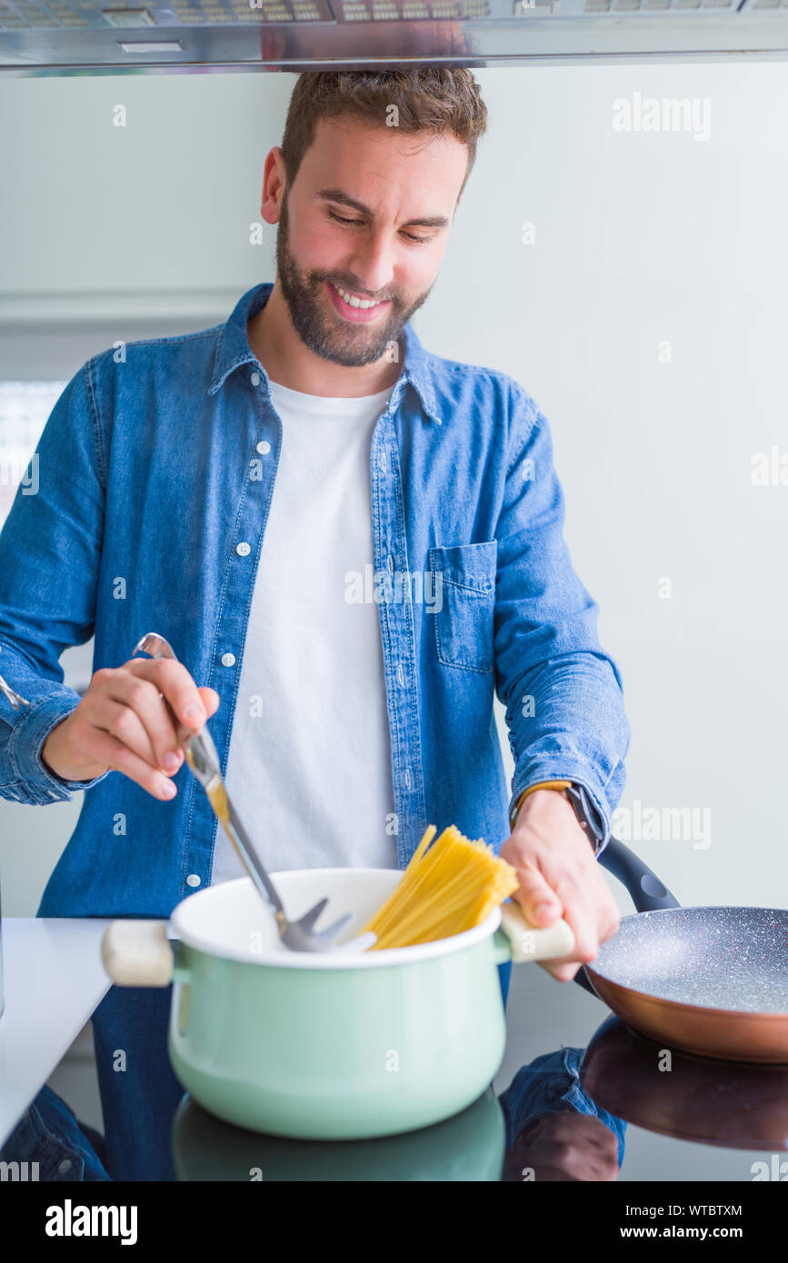 Hispanic boy eating pasta hi-res stock photography and images - Alamy